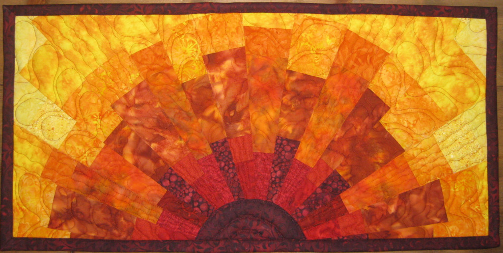 QUILT STITCHING on a sun design quilt - Art Quilts by Sharon